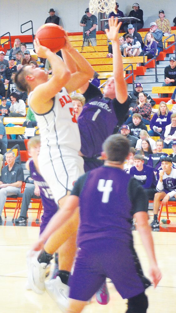 Beloit Trojan boys handle Southeast of Saline Trojans - Beloit Call