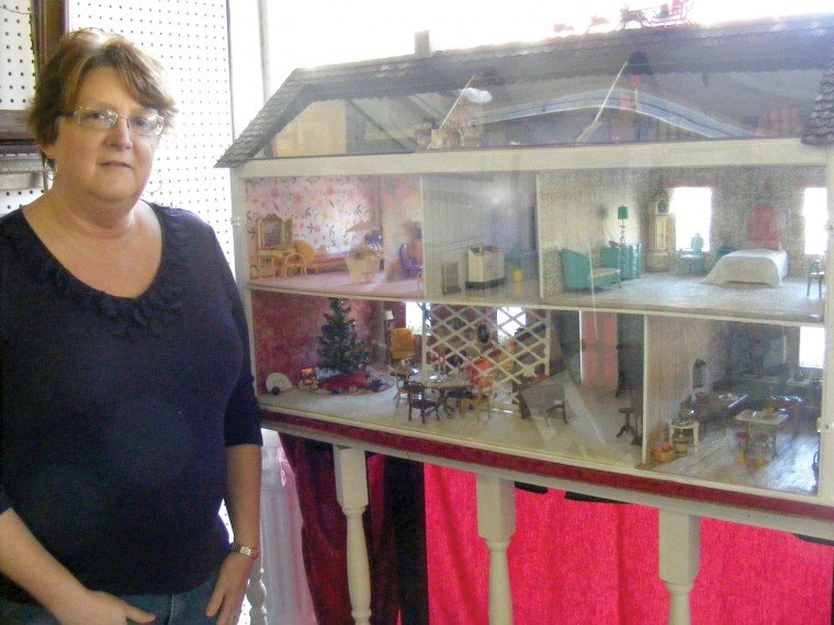 Winnie Burchell makes a doll of a house - Harrison Daily