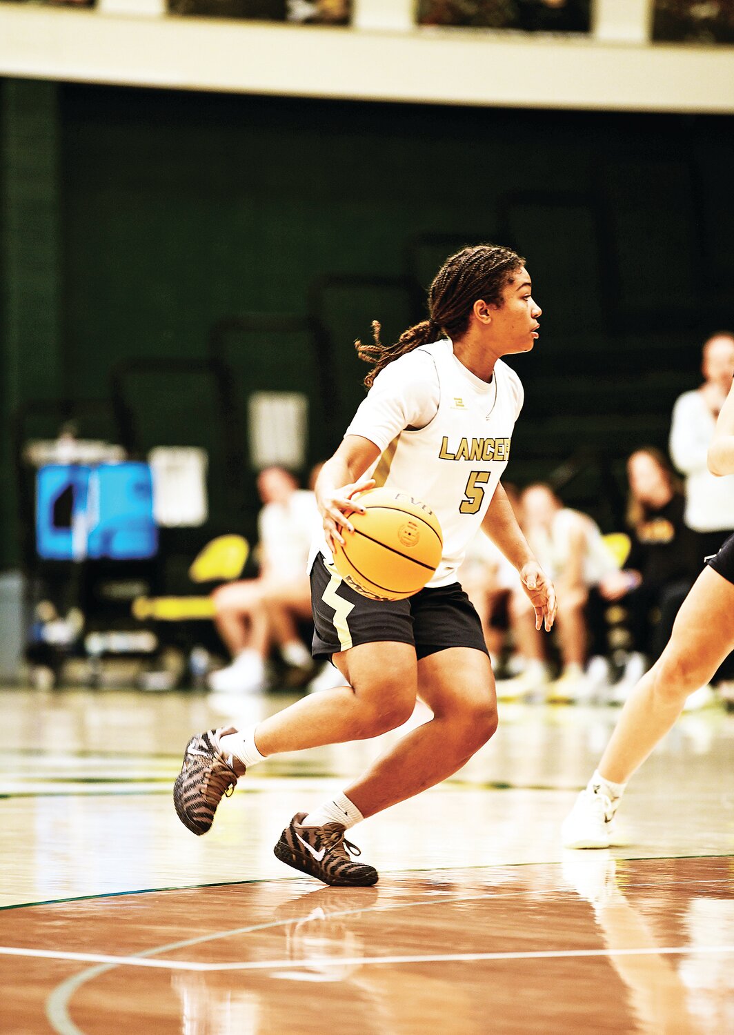 Hoops season opens with Lady Lancer win - Torrington Telegram