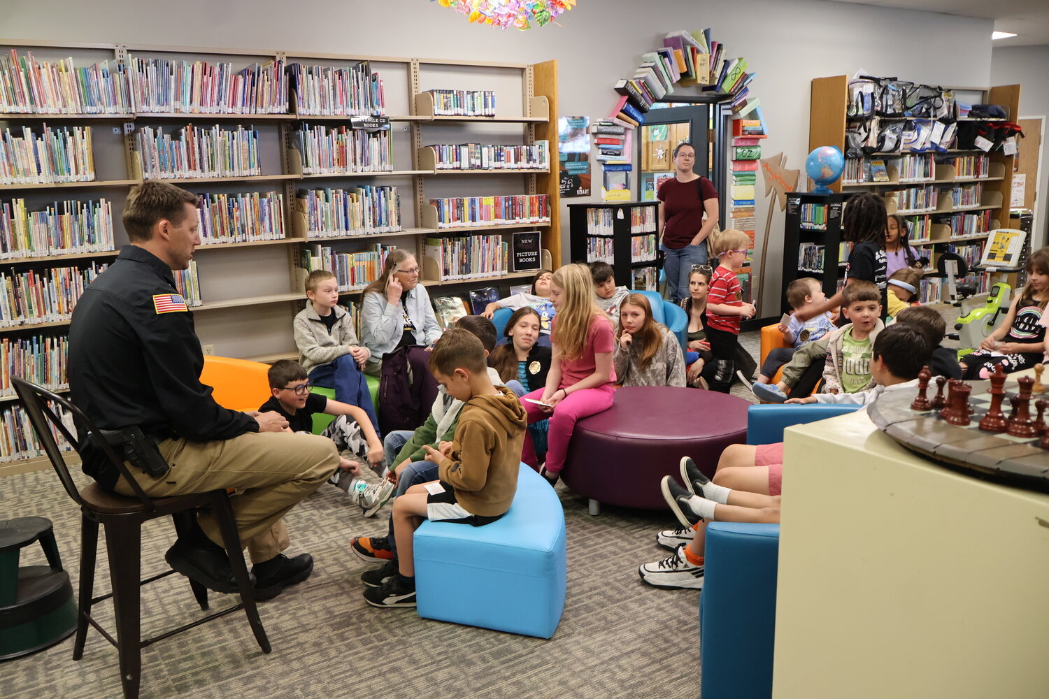 Local officers promote literacy at cops and kids events - Torrington ...